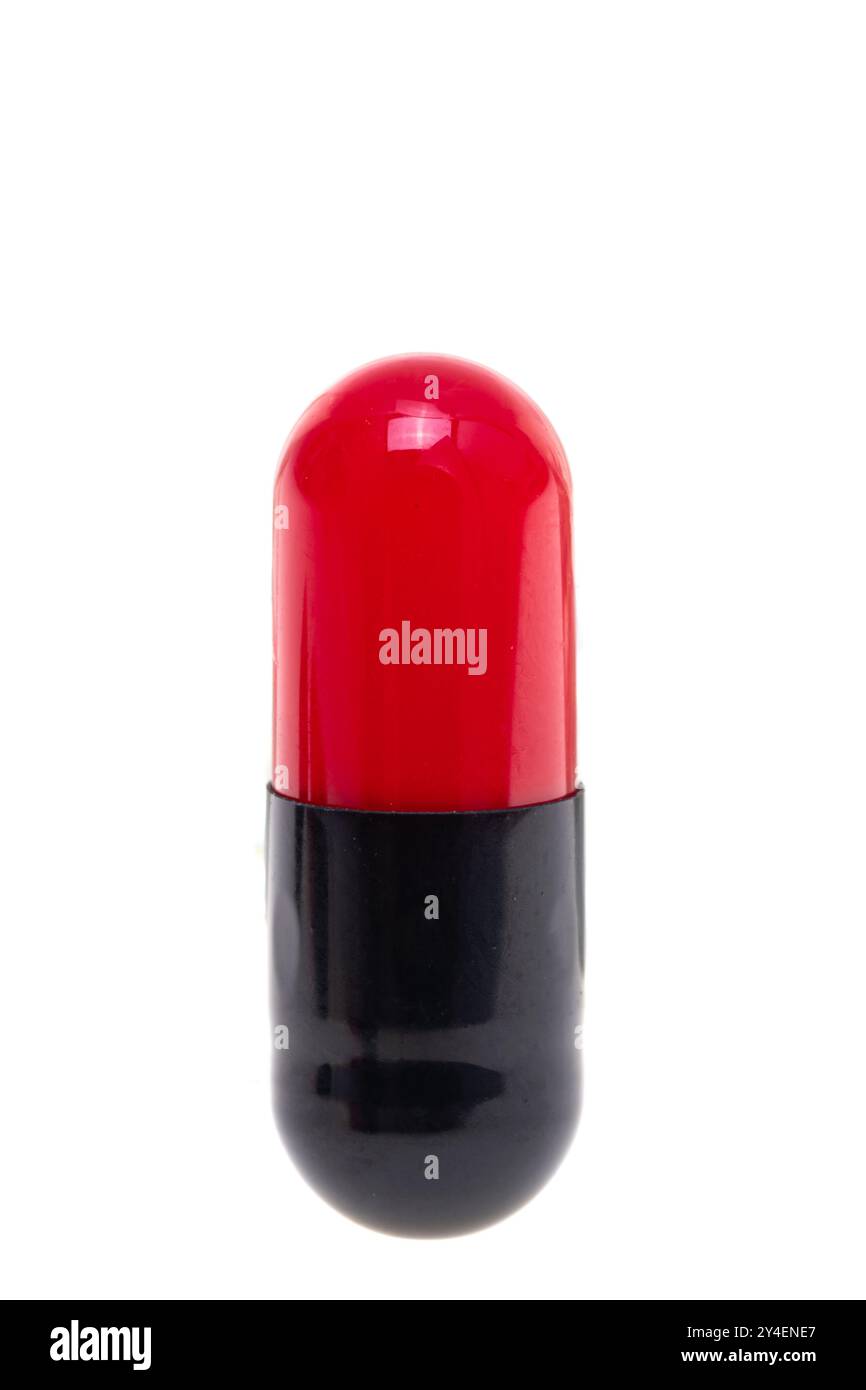 red black capsules isolated on white background Stock Photo - Alamy
