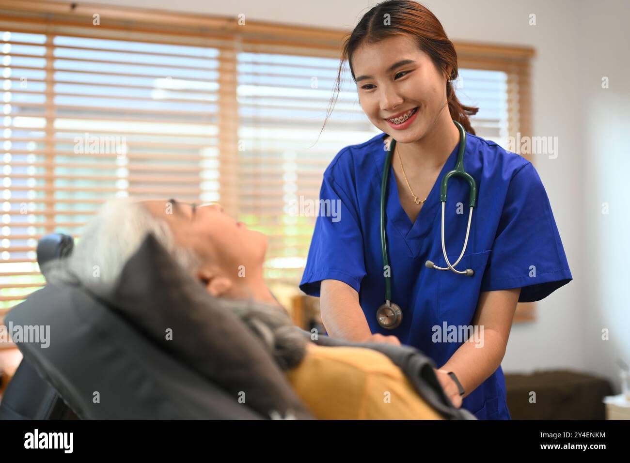 Physiotherapist doing pulmonary percussion to help loosen and drain ...