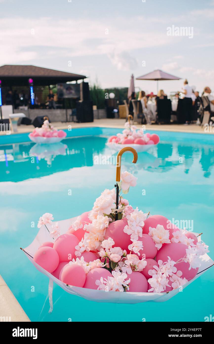 Wedding ceremony decoration in pool Stock Photo - Alamy