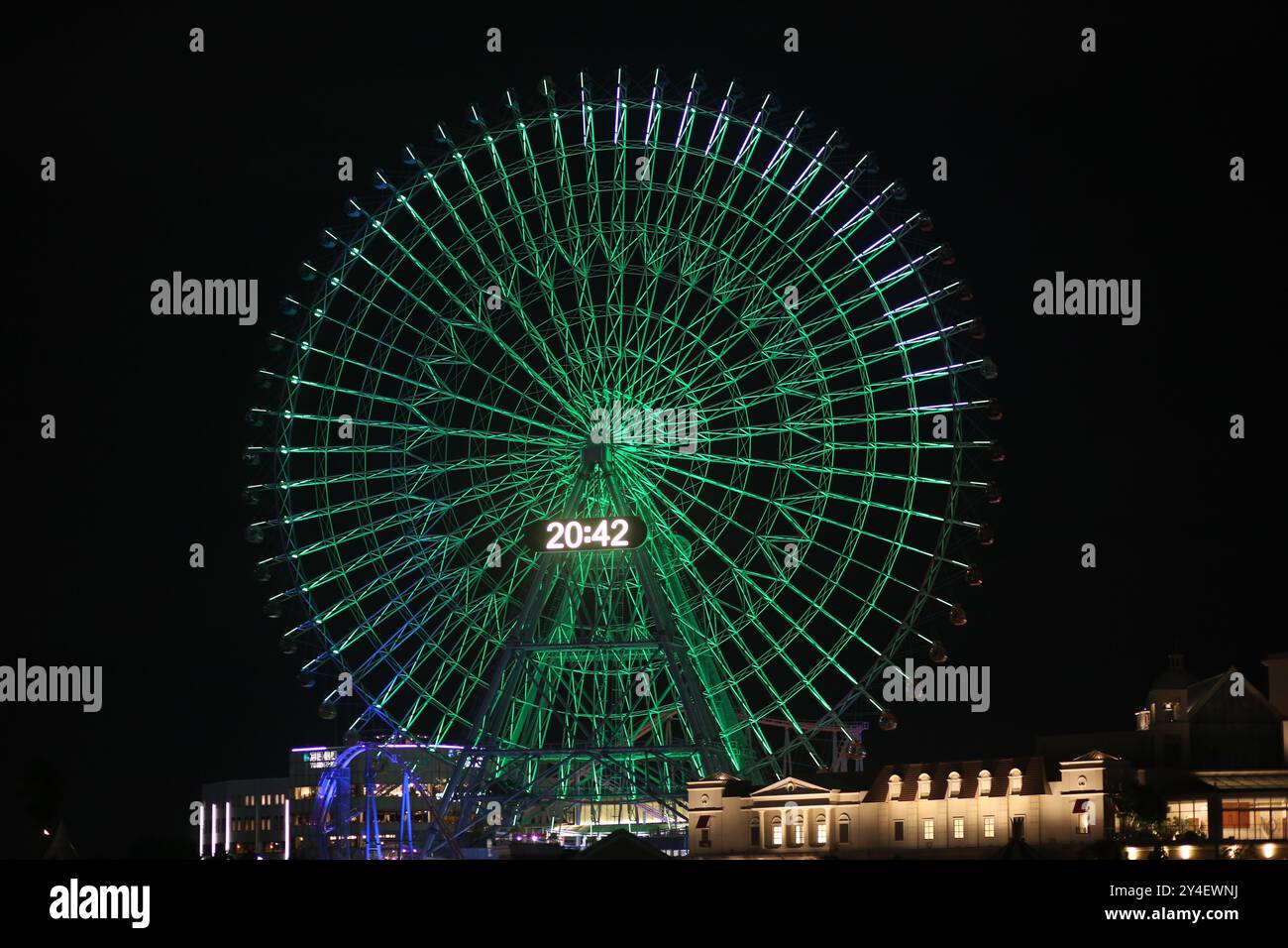 Iconic Cosmo Clock 21 Ferris wheel illuminated in green, Yokohama ...