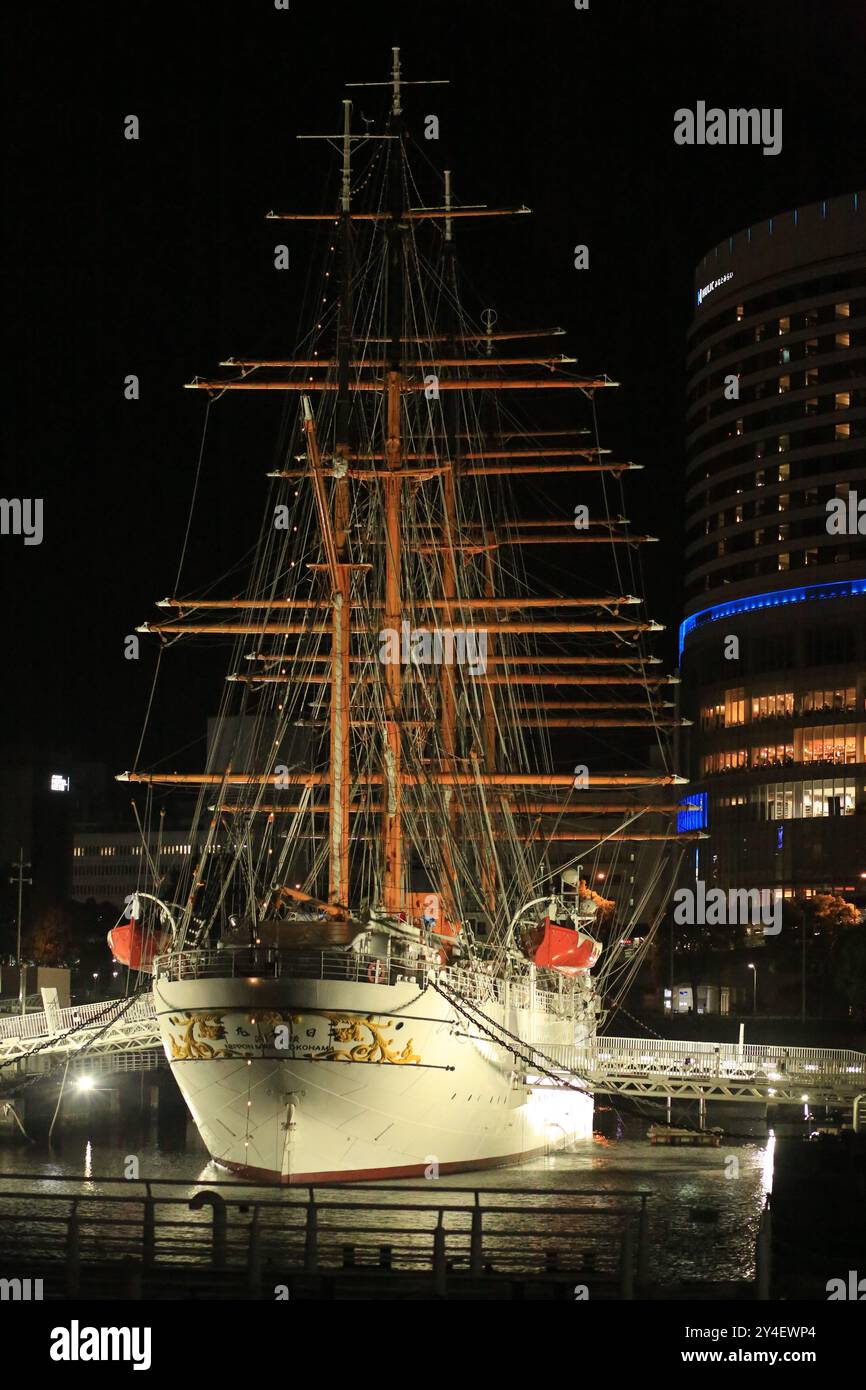 Historic sailing ship Nippon Maru docked at night in Yokohama Harbor ...