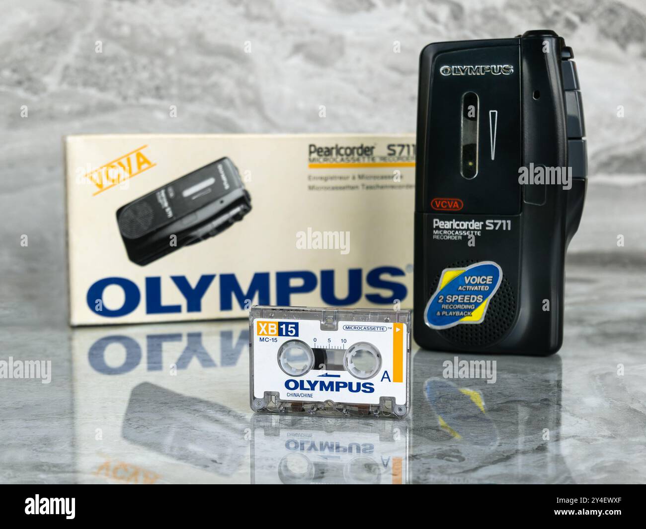 Olympus XB15 MC-15 microcassette on a polished marble surface against ...