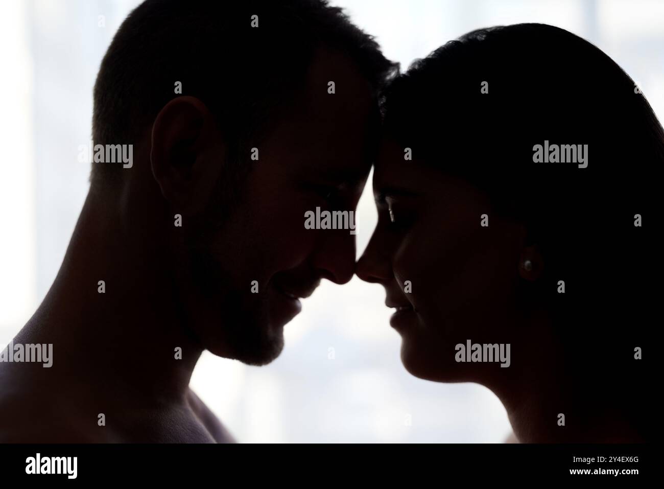 Home, silhouette and couple with love for bonding, intimacy or ...