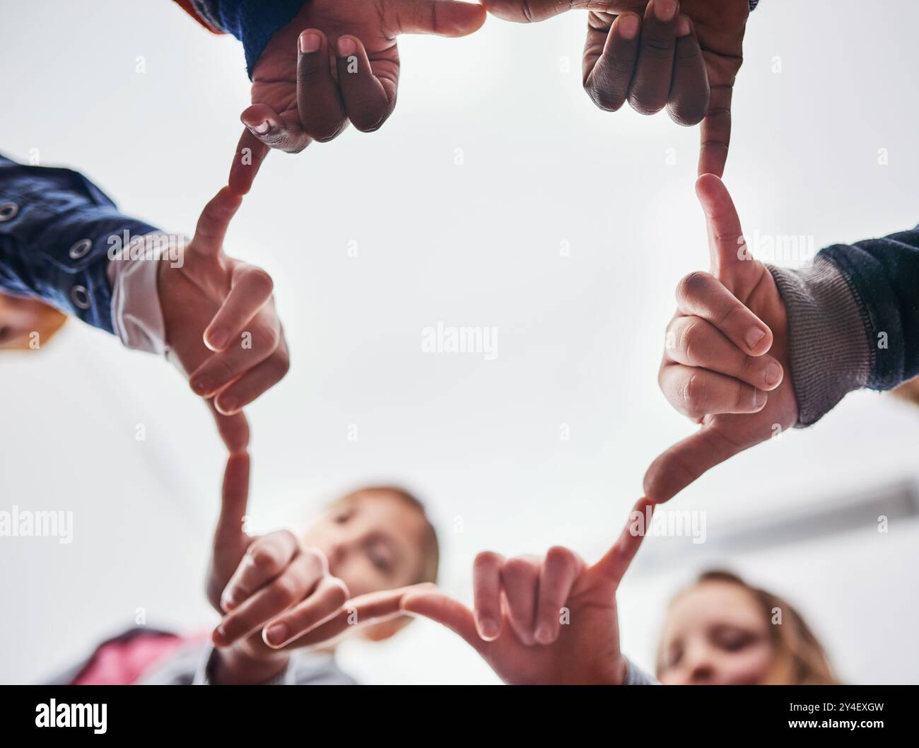Hands, friends and unity with children, group and huddle outdoor in ...