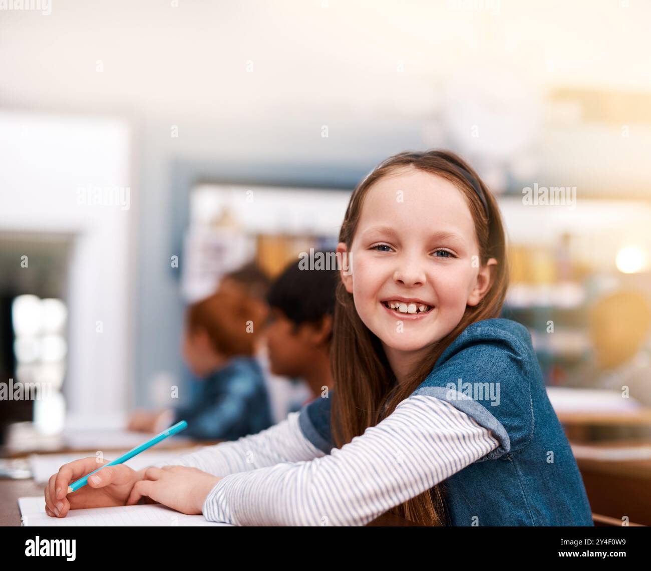 Portrait, smile and girl in classroom for education in growth, child ...