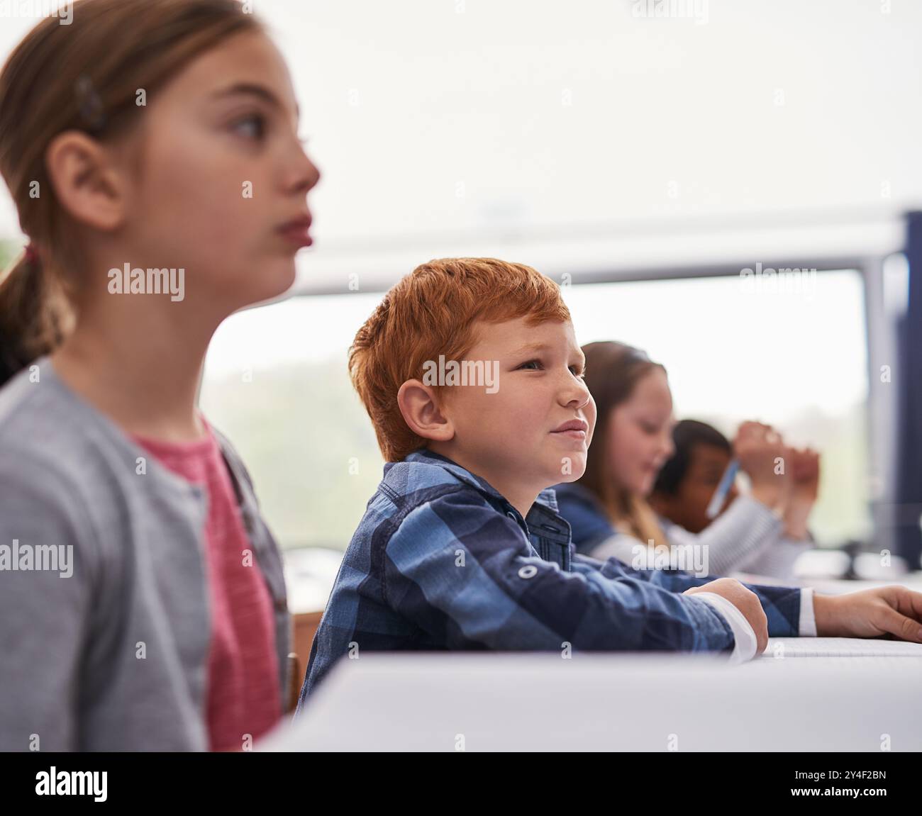 Desk, attention and kids in classroom for lesson in growth, child ...