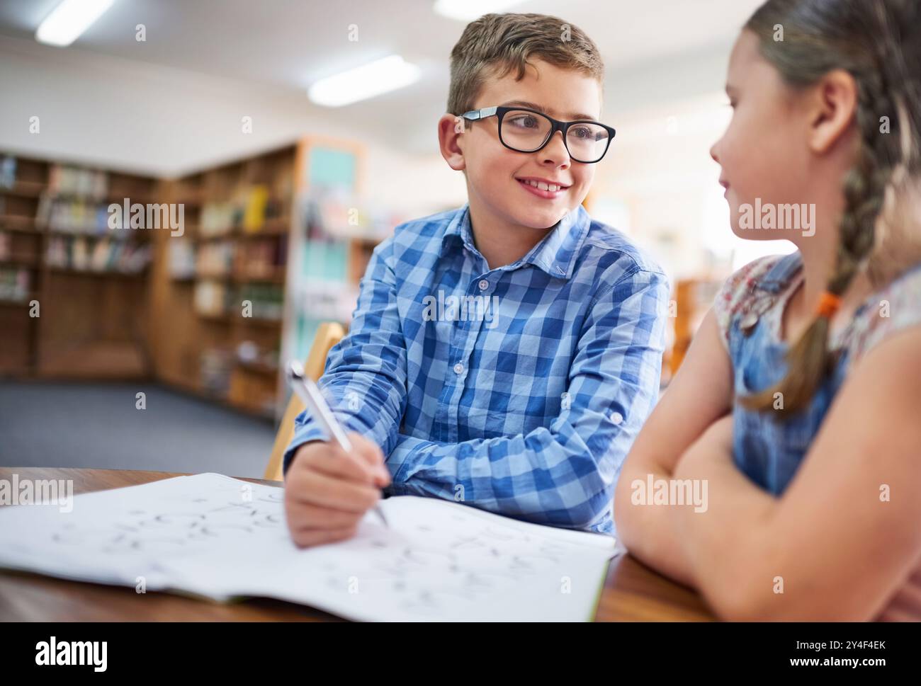 Math, happy kids or students writing in library for education, child ...