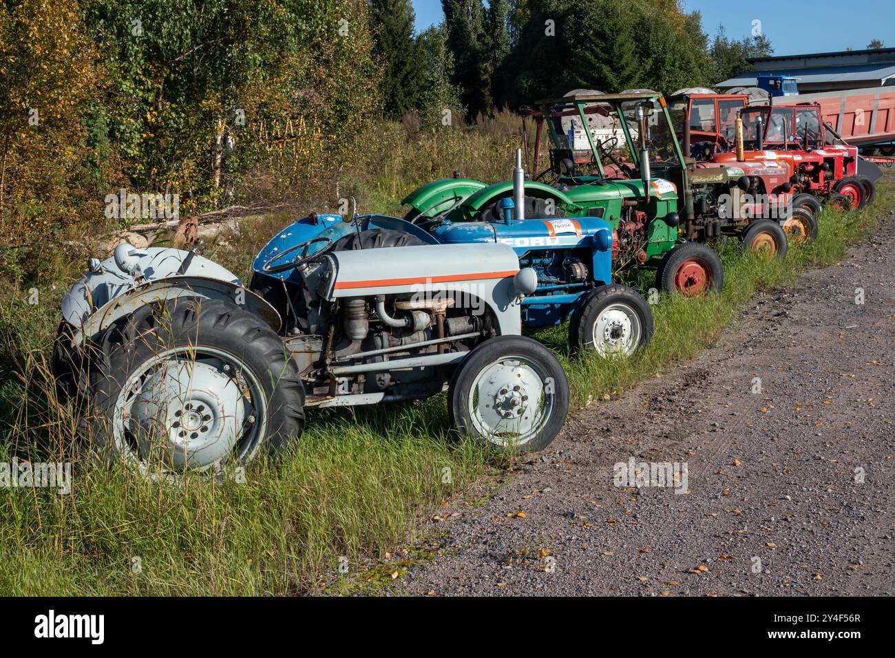 group of vintage old tractors outdoors Stock Photo - Alamy