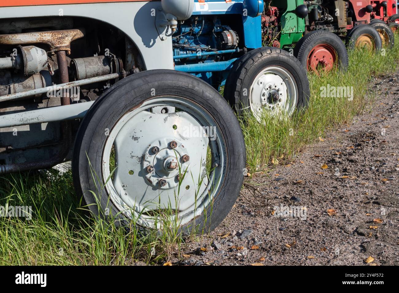 group of vintage old tractors outdoors Stock Photo - Alamy