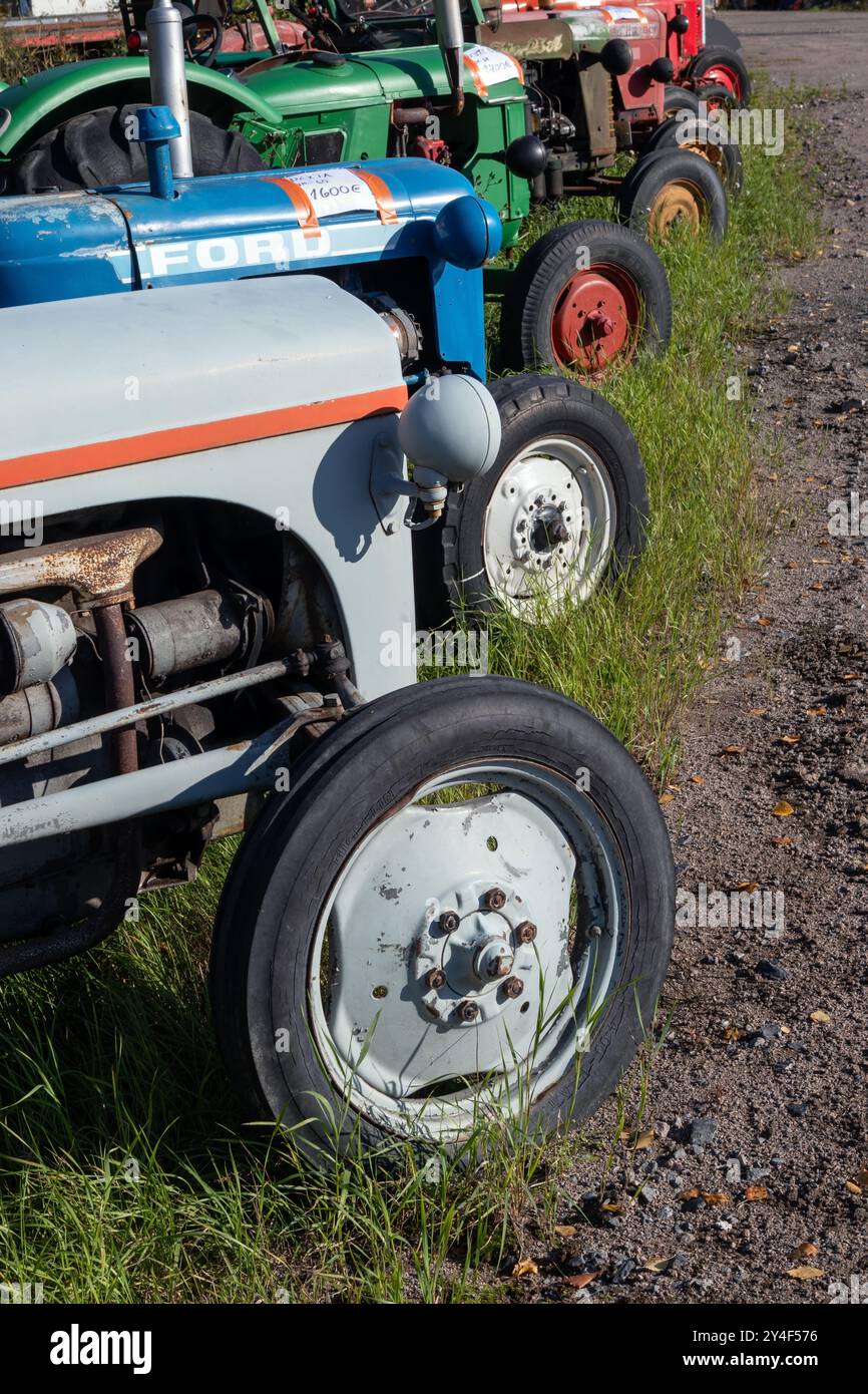 group of vintage old tractors outdoors Stock Photo - Alamy