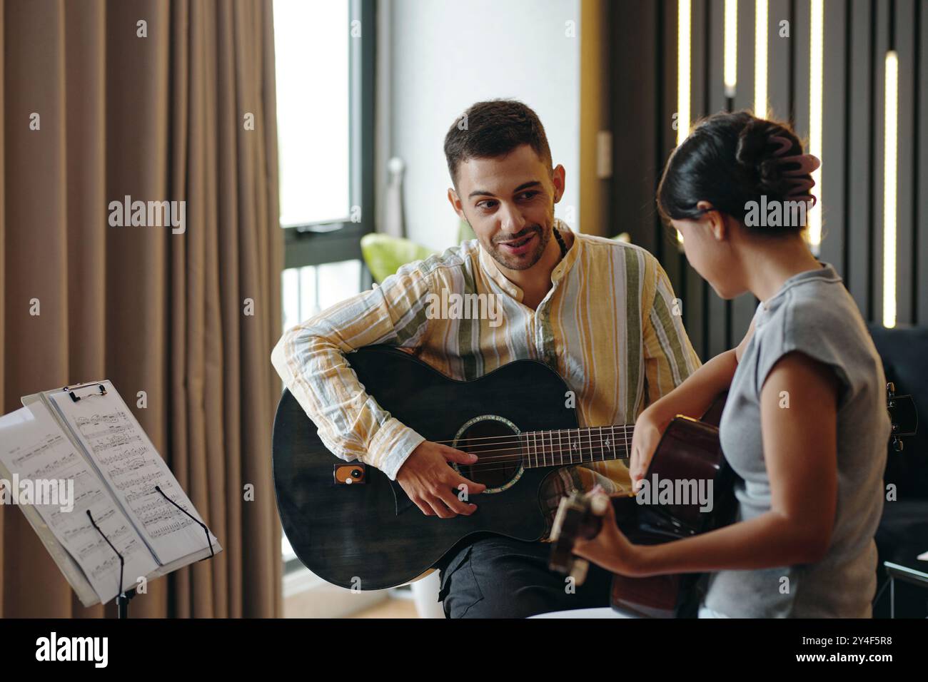 Shared musical moment hi-res stock photography and images - Alamy