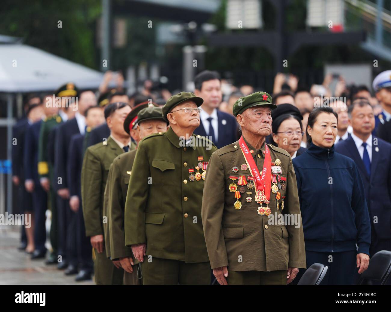 Shenyang, China's Liaoning Province. 18th Sep, 2024. People attend a ...