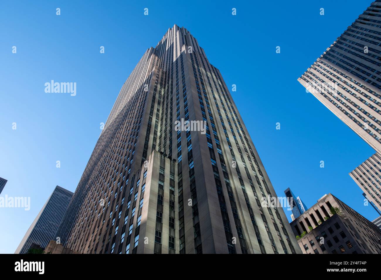 Upside view of Empire State building in New York city with clear sky ...