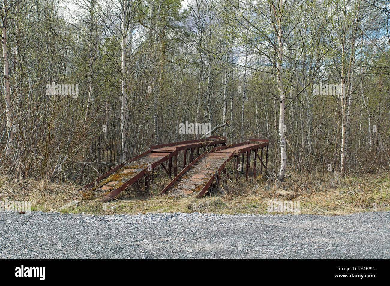 Old abandoned rusty car repair ramp to repair cars Stock Photo - Alamy