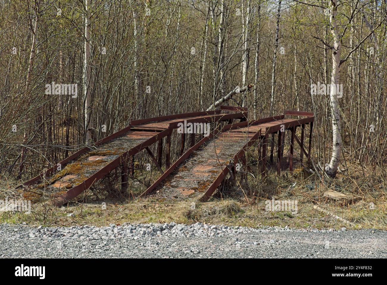 Old abandoned rusty car repair ramp to repair cars Stock Photo - Alamy