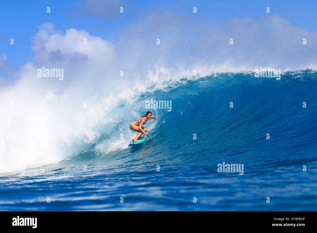 French Polynesia, Tuamotu archipelago, atoll of Faaite: Surfer Marie ...