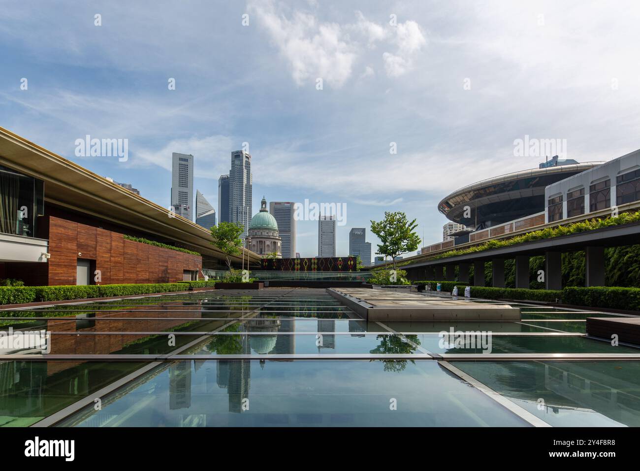 Roof top of National Gallery Singapore and water reflection with plenty ...