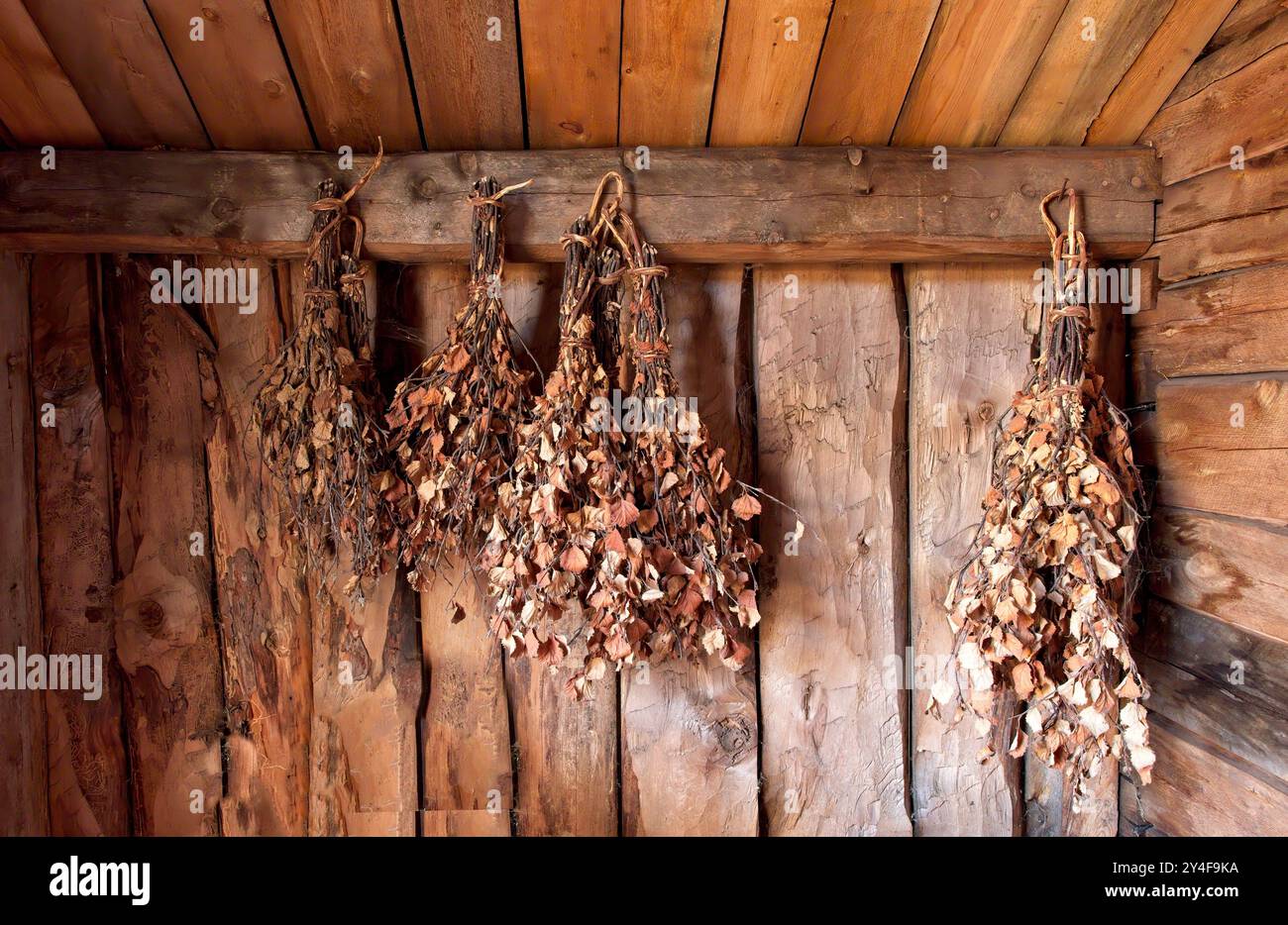 Old dried sauna whisk broom also known as vasta, vihta or venik hanging ...