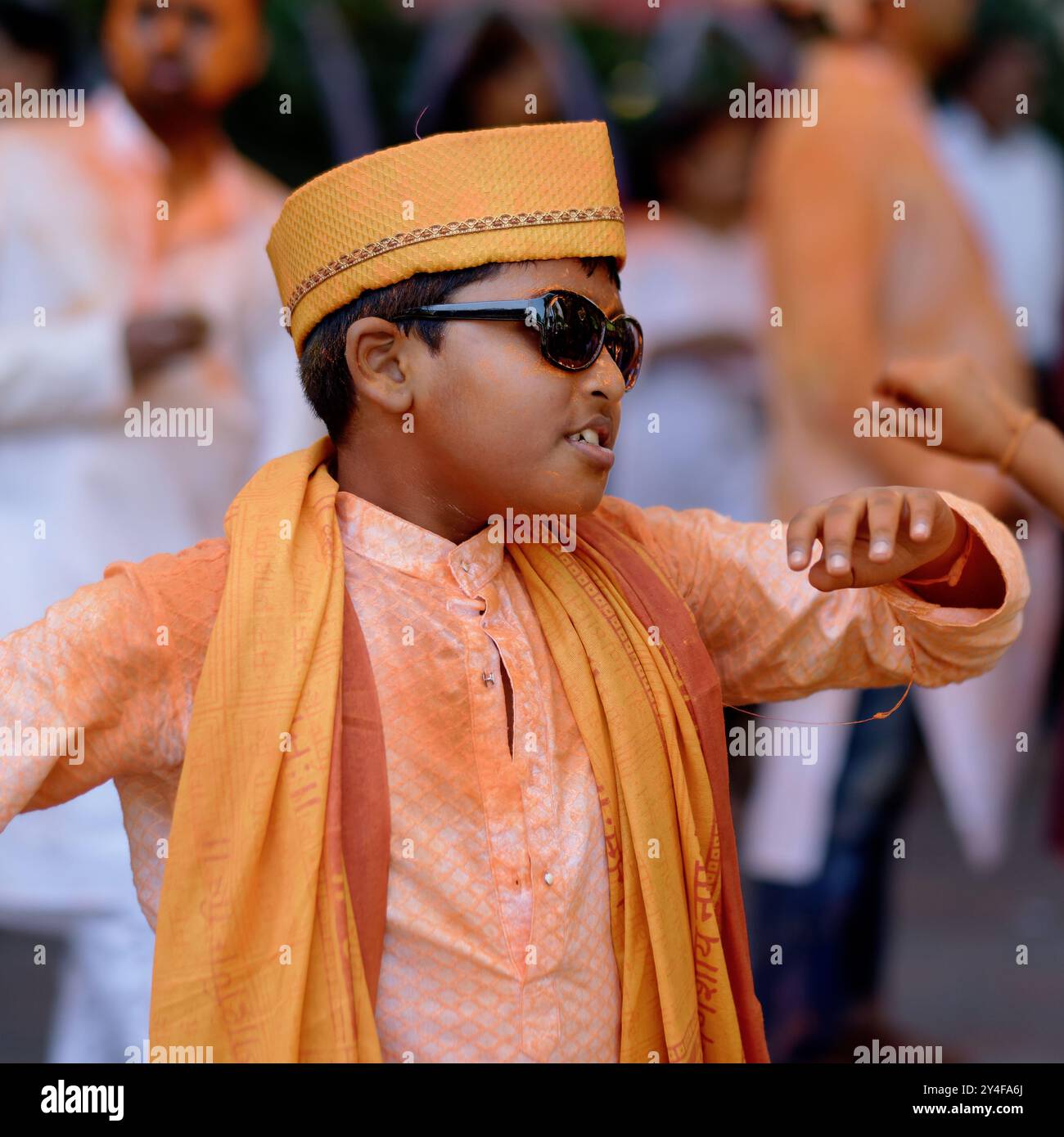Mumbai, Maharashtra, India: A Maharashtrian boy in orange, 'Hindu ...