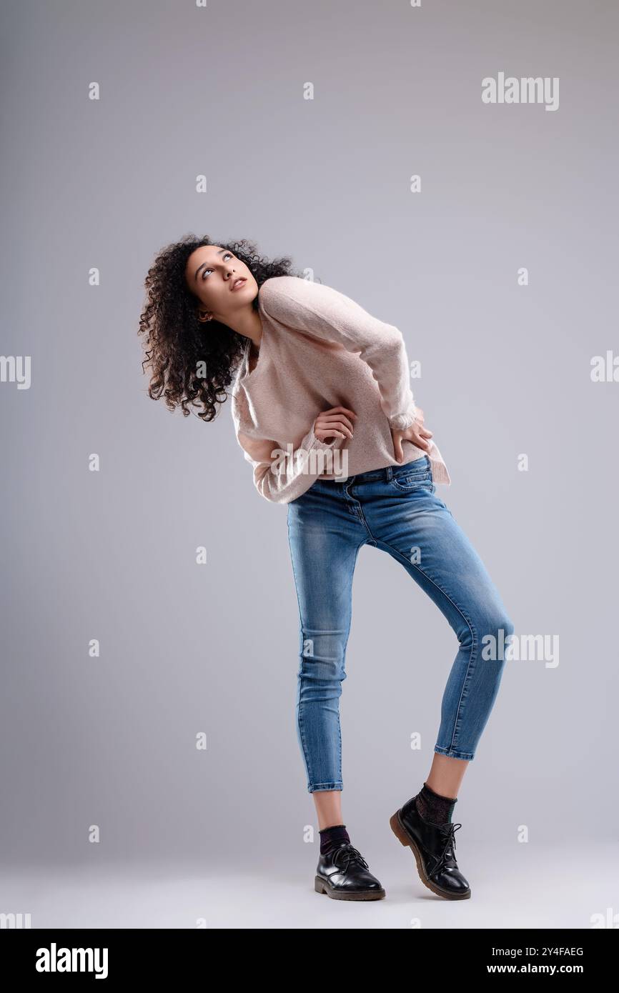 Beautiful young woman arching back hi-res stock photography and images ...