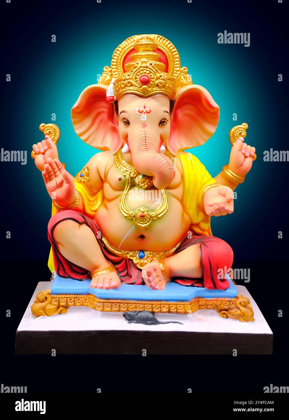 Hindu God Ganesha on Blue background, Ganesha Idol. Ganesh festival ...