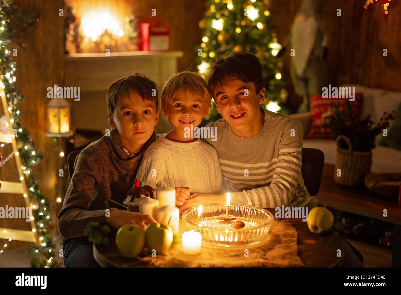 Three children, lighting candles in a nutshell, czech Christmas ...