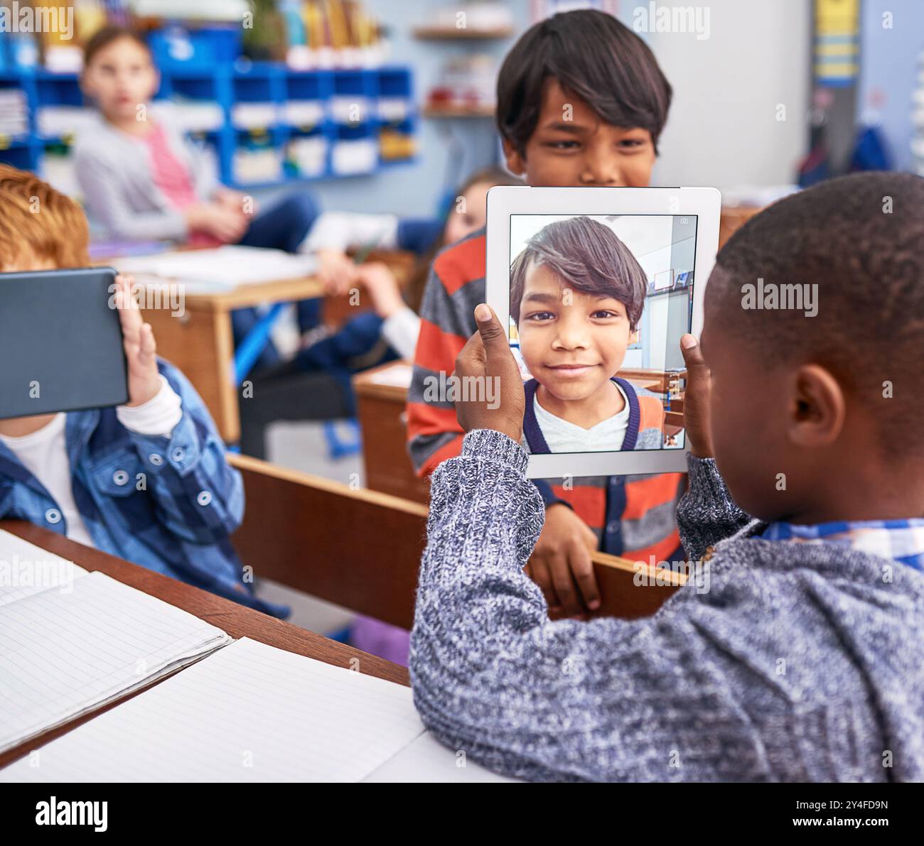 Kids, tablet and photography in classroom for education, daycare ...