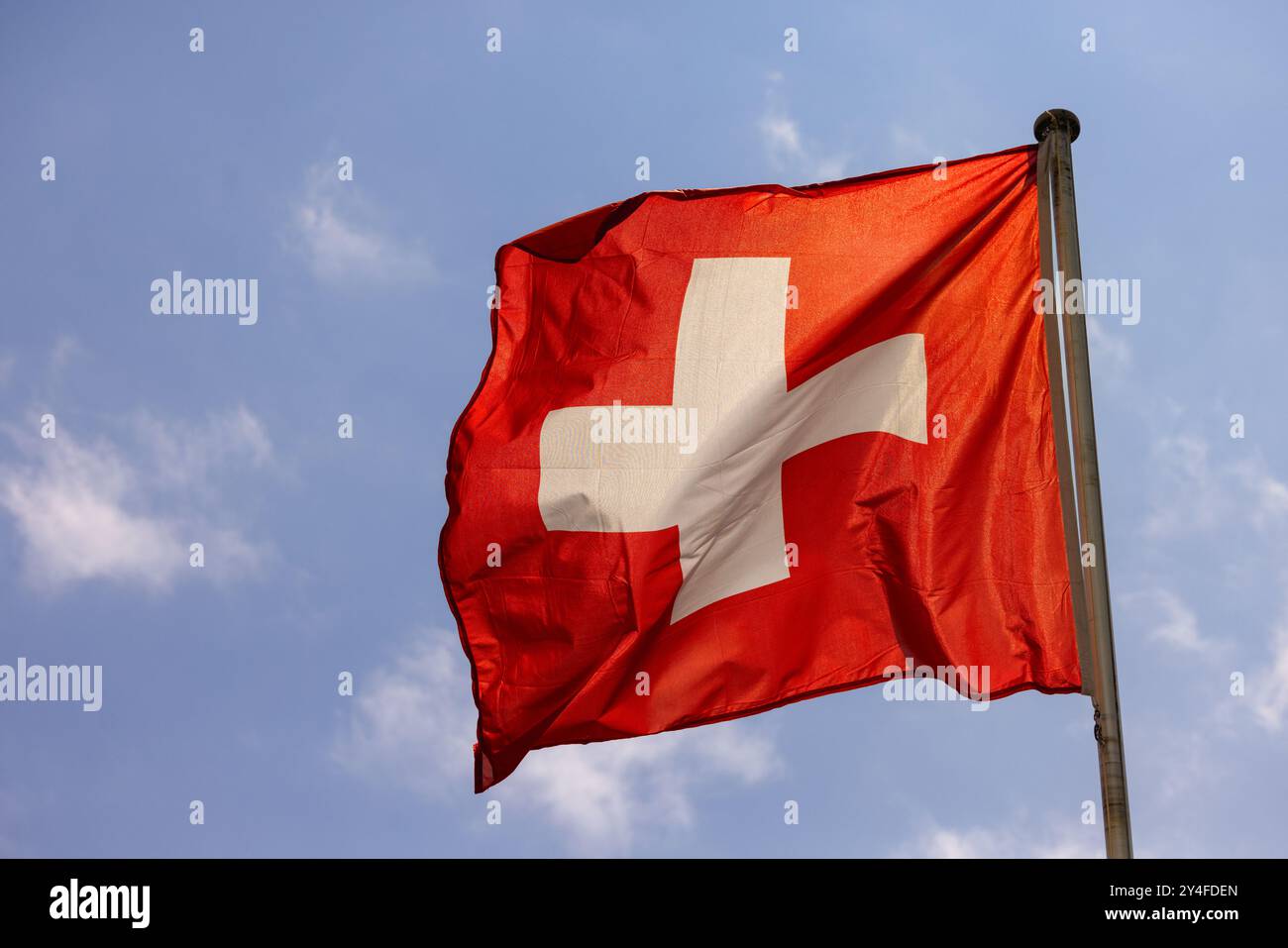 Swiss flag waving in the wind Stock Photo - Alamy