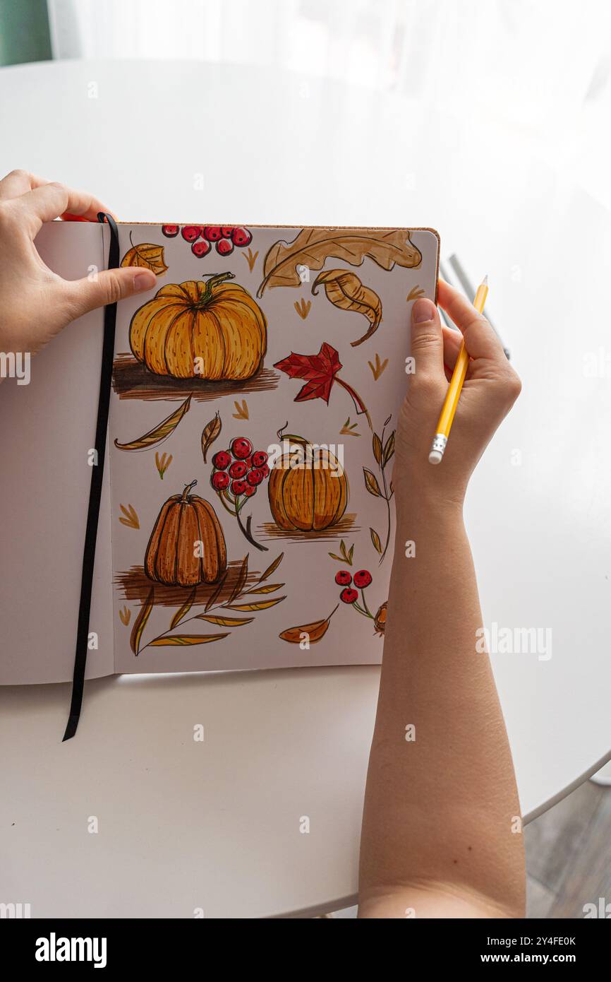 Hand drawing colorful autumn-themed Stock Photo - Alamy