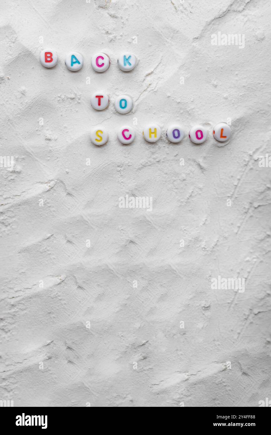 Colorful Alphabet Beads Spelling Back Stock Photo - Alamy