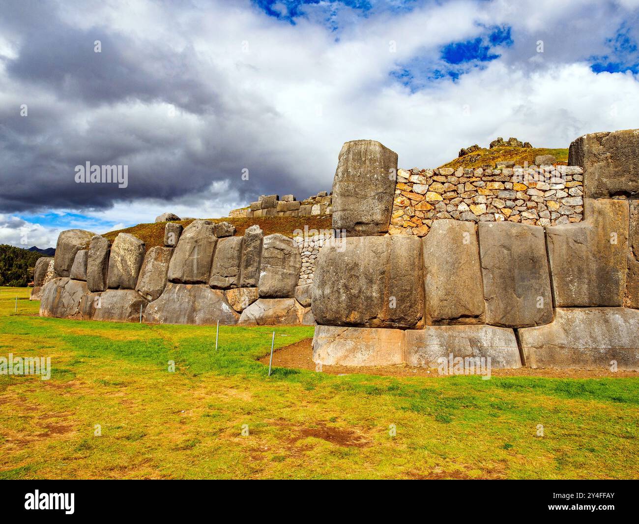 Large polished dry stone walls of the Saksaywaman military Inca complex ...
