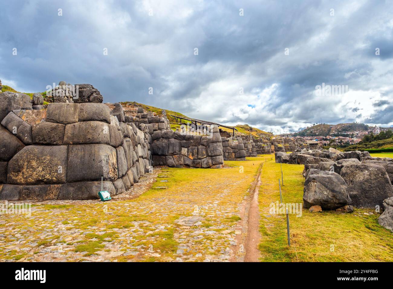 Large polished dry stone walls of the Saksaywaman military Inca complex ...