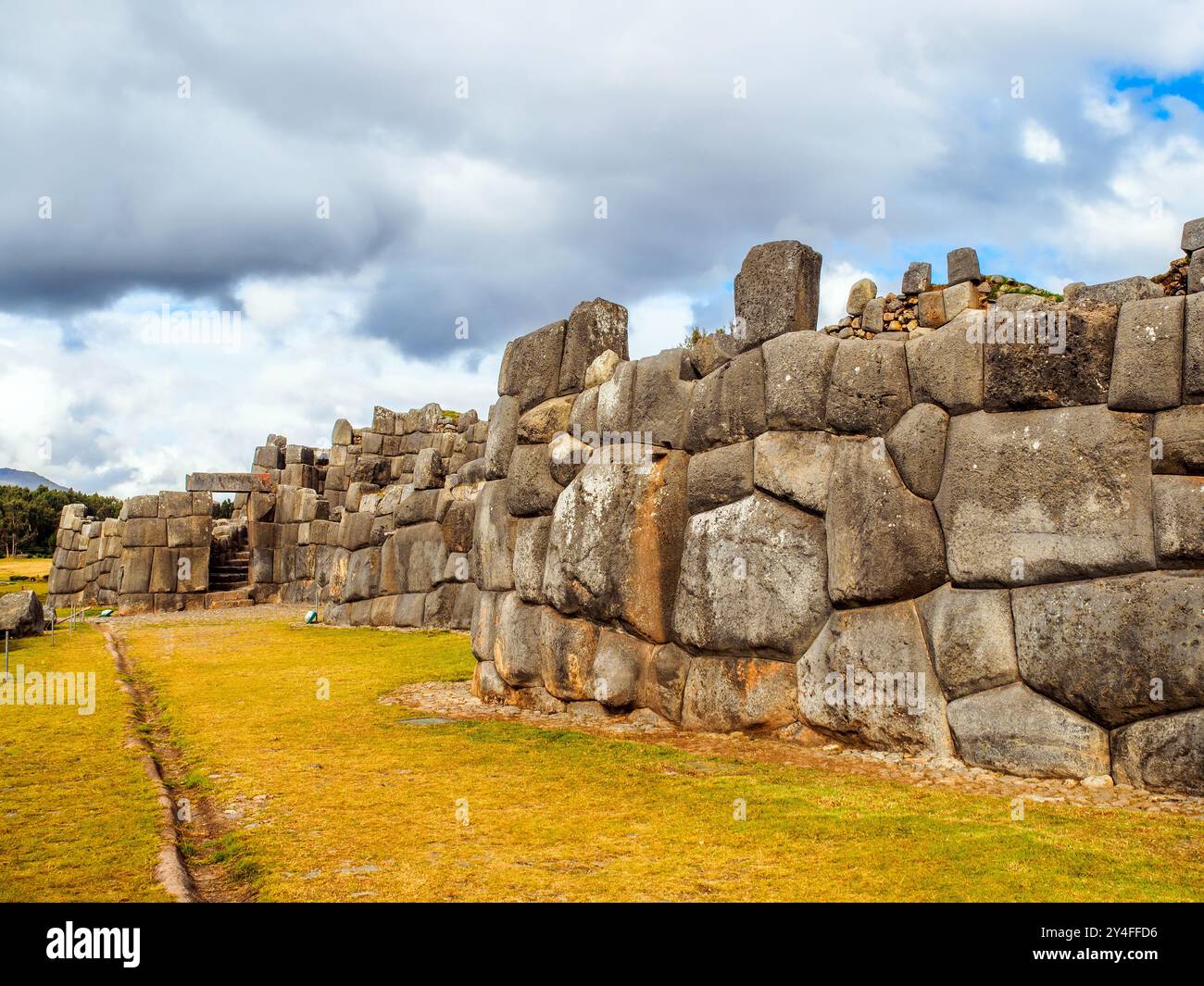 Large polished dry stone walls of the Saksaywaman military Inca complex ...