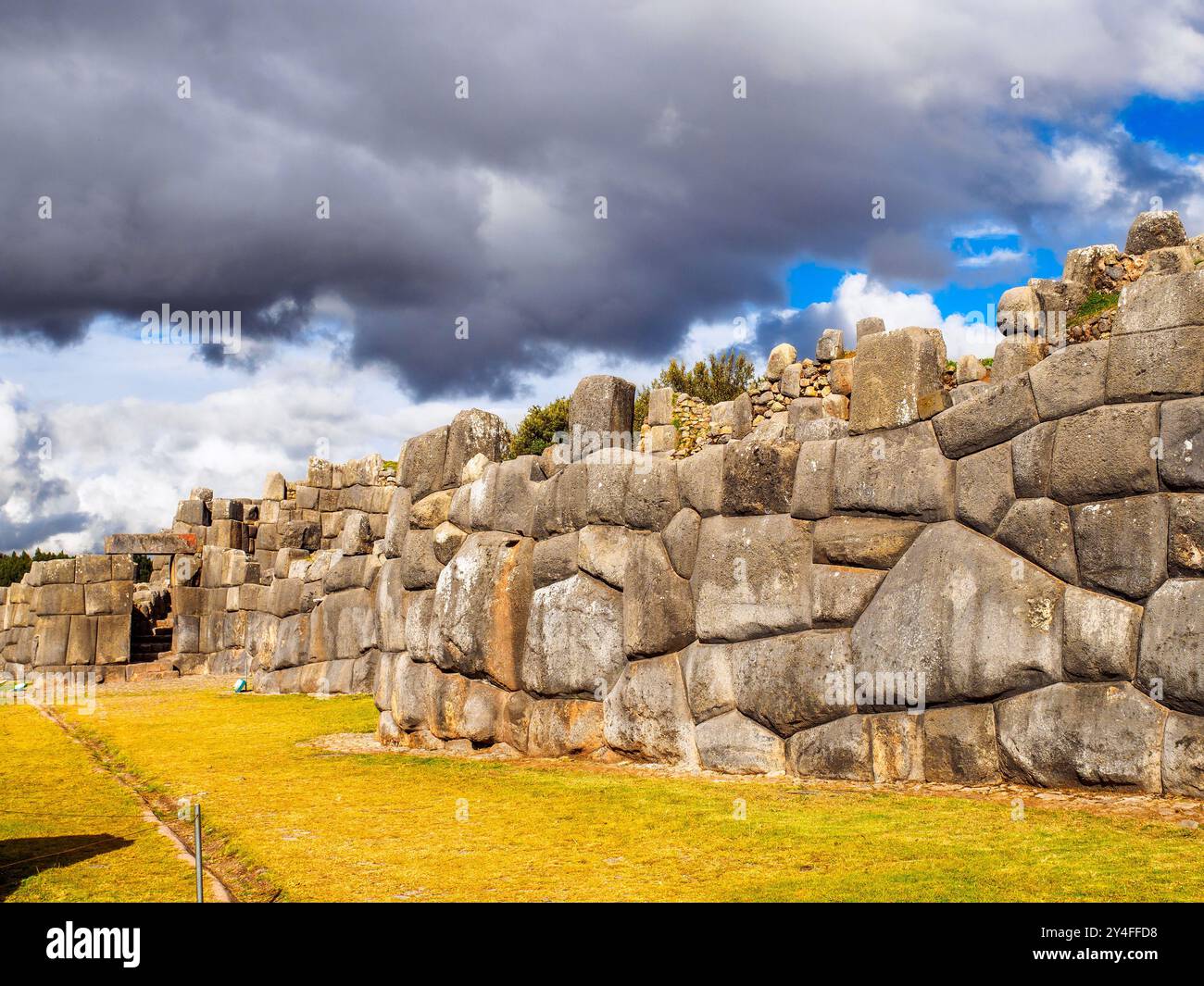 Large polished dry stone walls of the Saksaywaman military Inca complex ...
