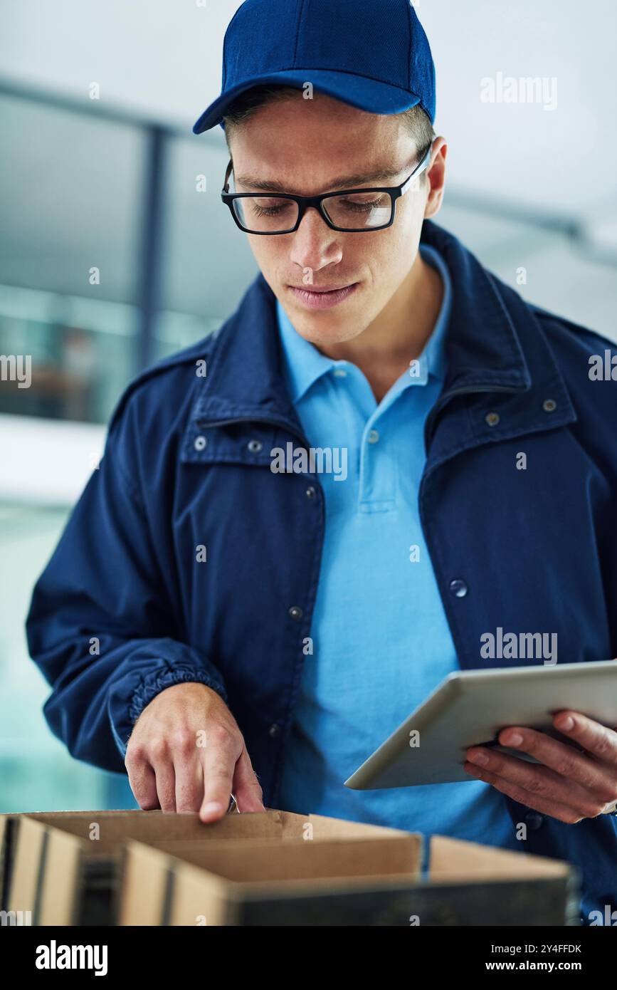 Logistics, man and tablet at boxes for delivery, checklist and ...