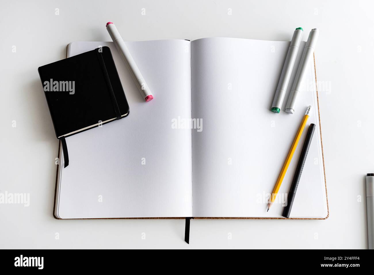 Open notebook with stationery for Stock Photo - Alamy