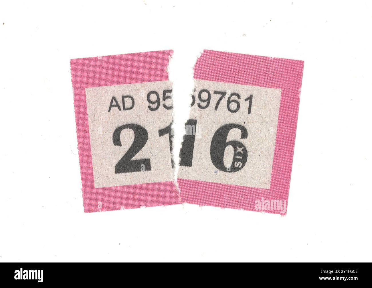 A raffle ticket torn in half on a white background Stock Photo - Alamy