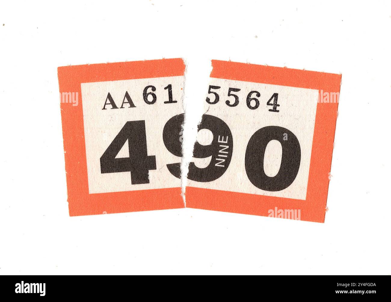 A raffle ticket torn in half on a white background Stock Photo - Alamy