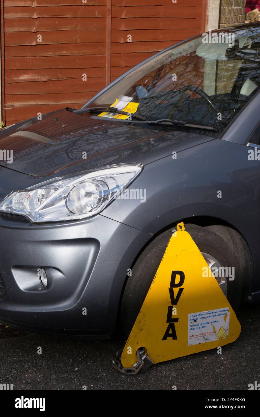 Law & Order, Traffic Control, Parking, Front wheel of car clamped by ...