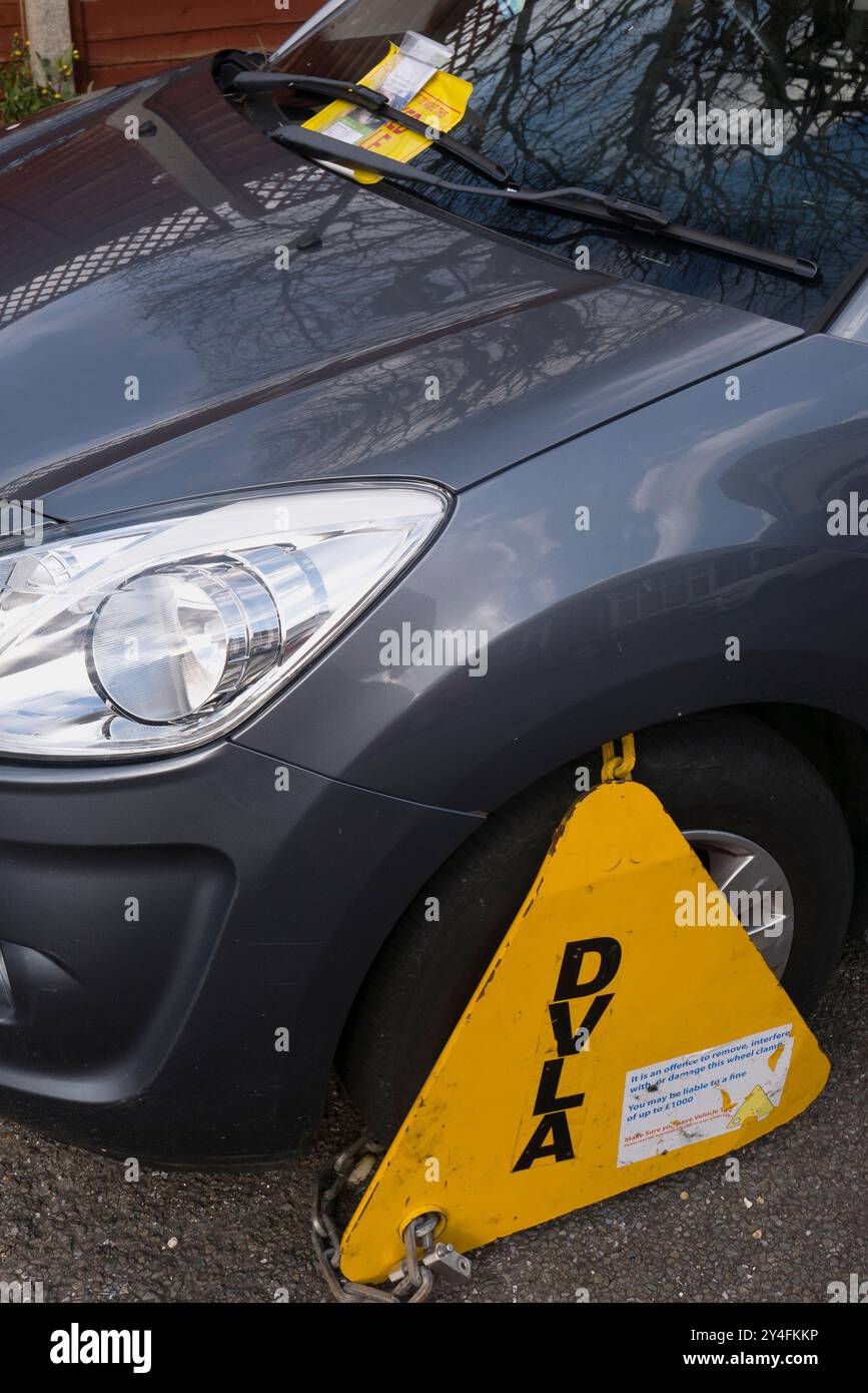 Law & Order, Traffic Control, Parking, Front wheel of car clamped by ...