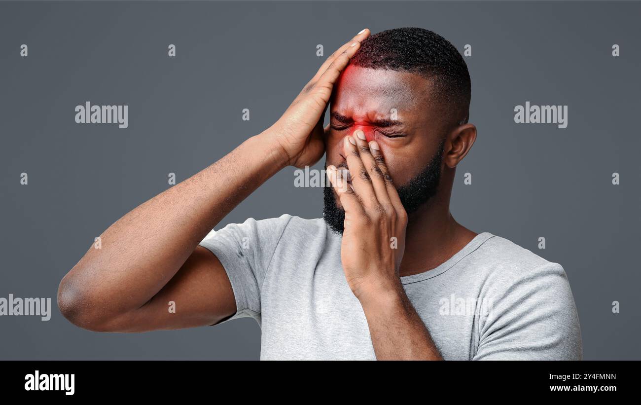Guy having pain in forehead and nose, suffering from antritis Stock ...