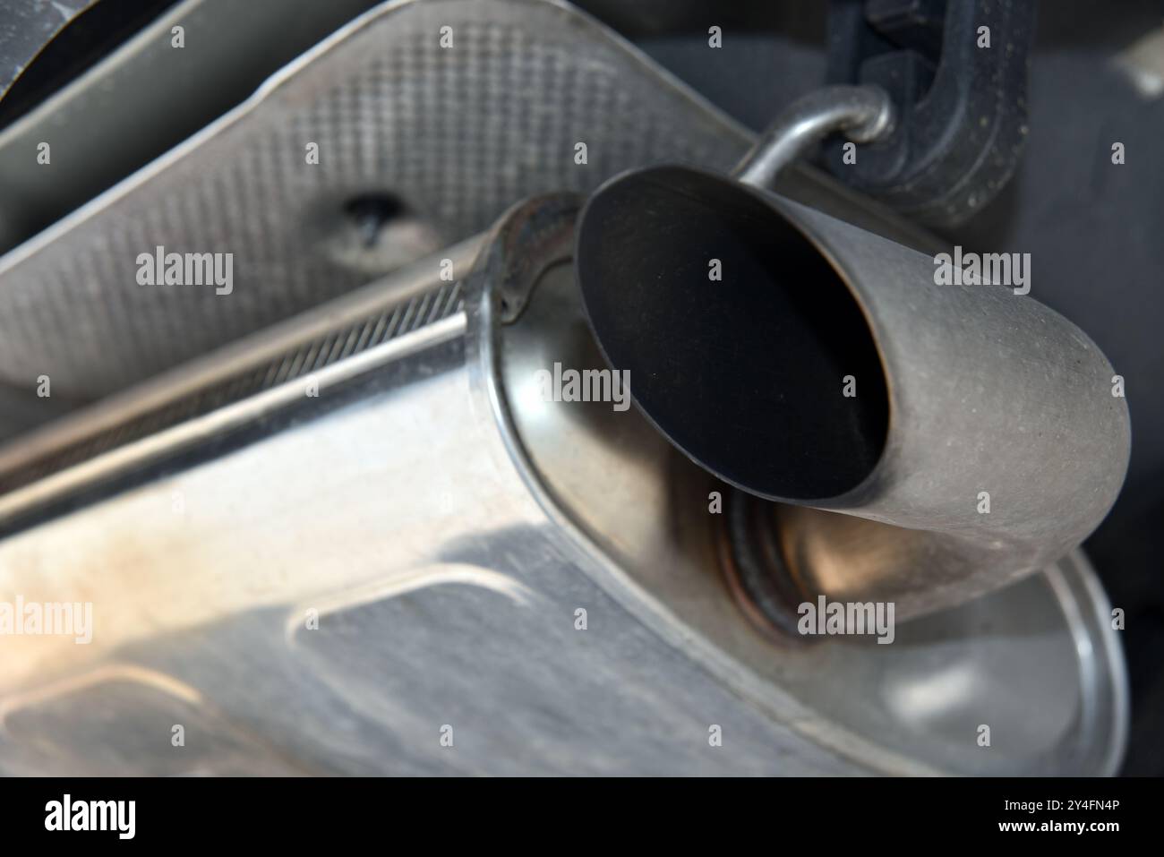 ne exhaust pipe at the rear of the passenger car, part of the car Stock ...
