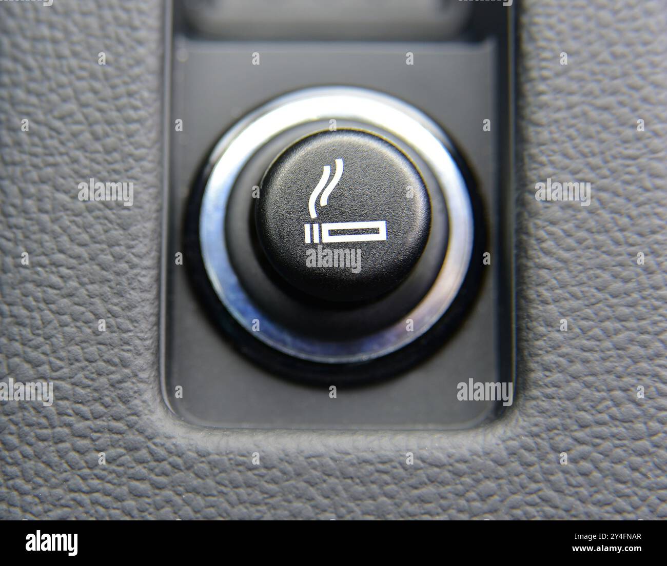 Cigarette lighter on the dashboard of a passenger car Stock Photo - Alamy