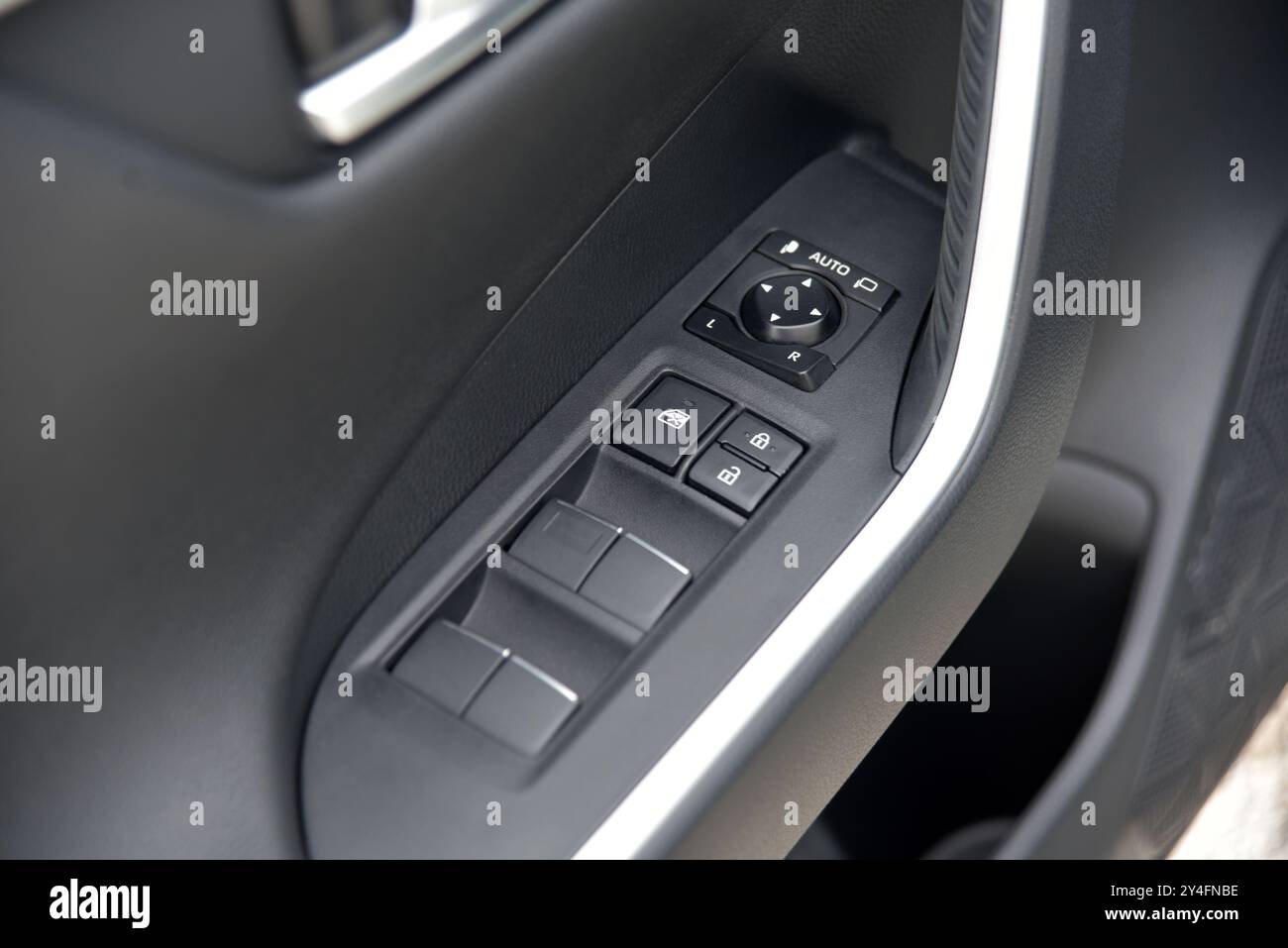 Side mirror switch control and window button Stock Photo - Alamy