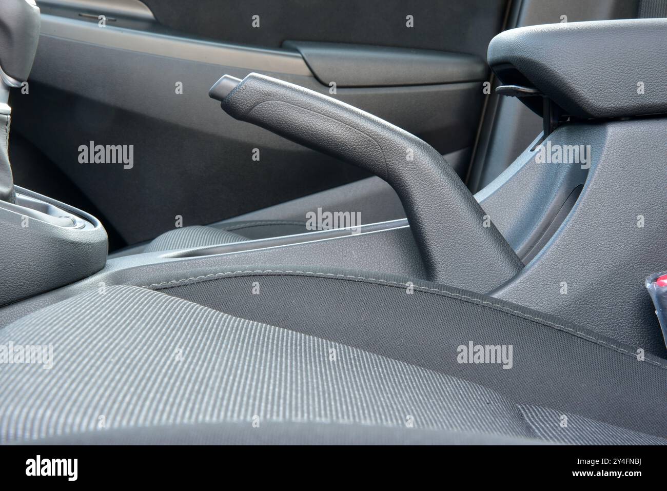 Manual brake in interior of modern car. Car parking brake Stock Photo ...