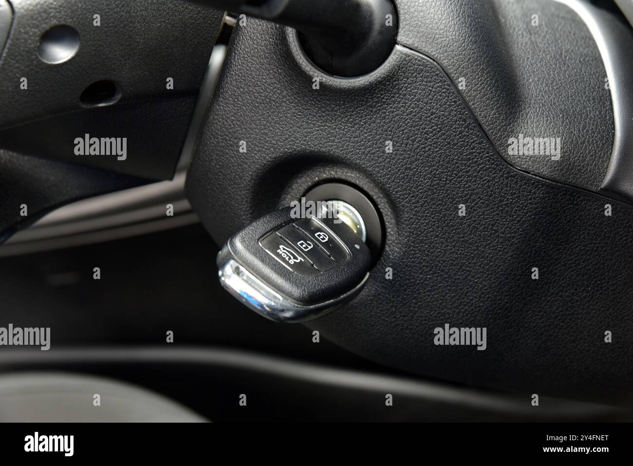 Car key in ignition. Contact lock for activating the car engine and ...