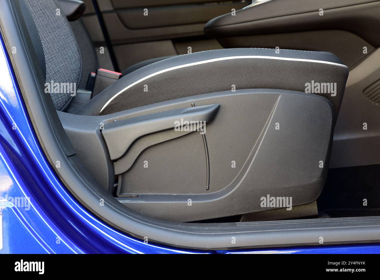 Lever for adjusting the seat position Stock Photo - Alamy