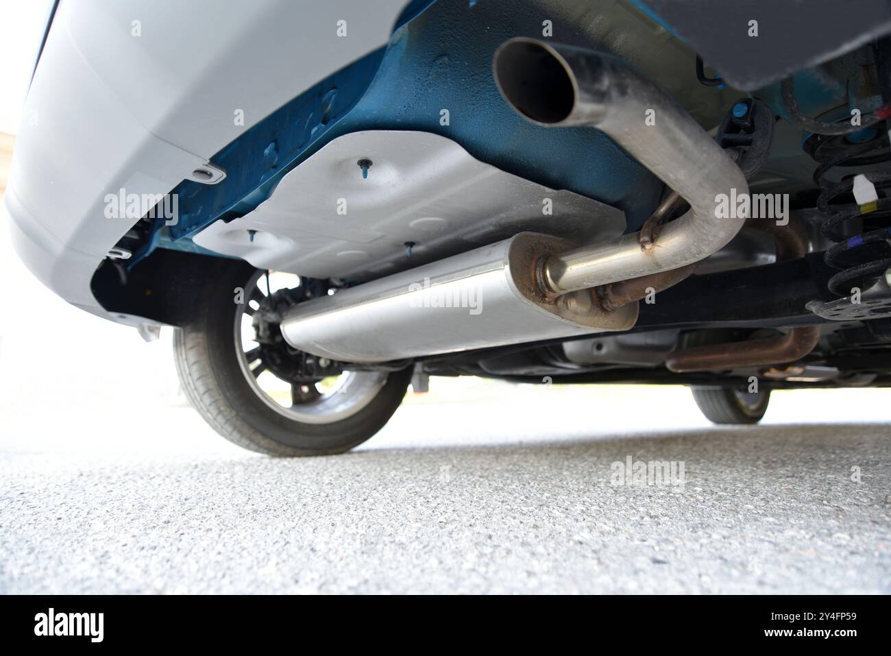 Exhaust system of the car. The muffler of exhaust gases Stock Photo - Alamy