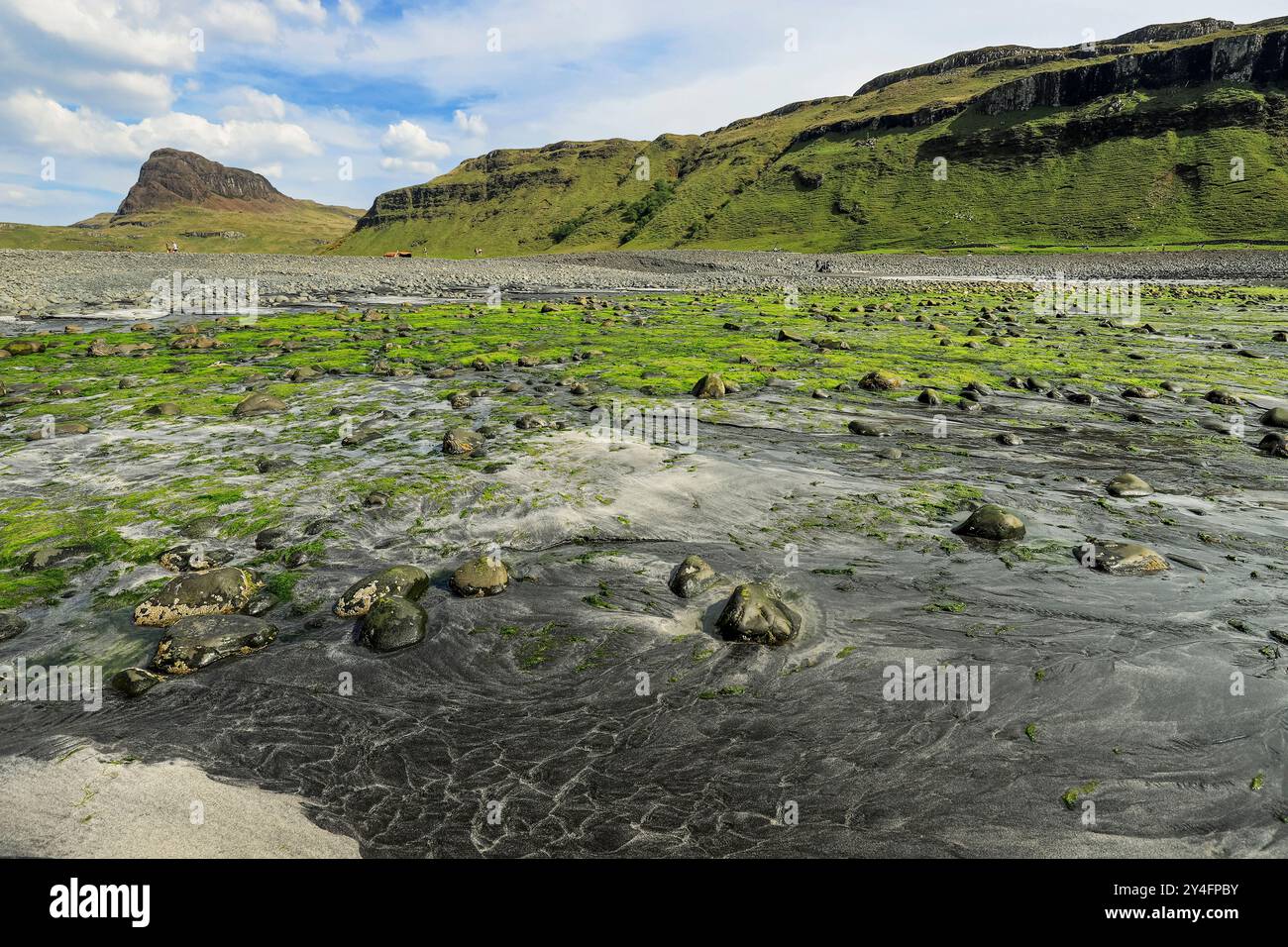 White & black sand beach at Talisker Bay with Preshal More beyond, both ...