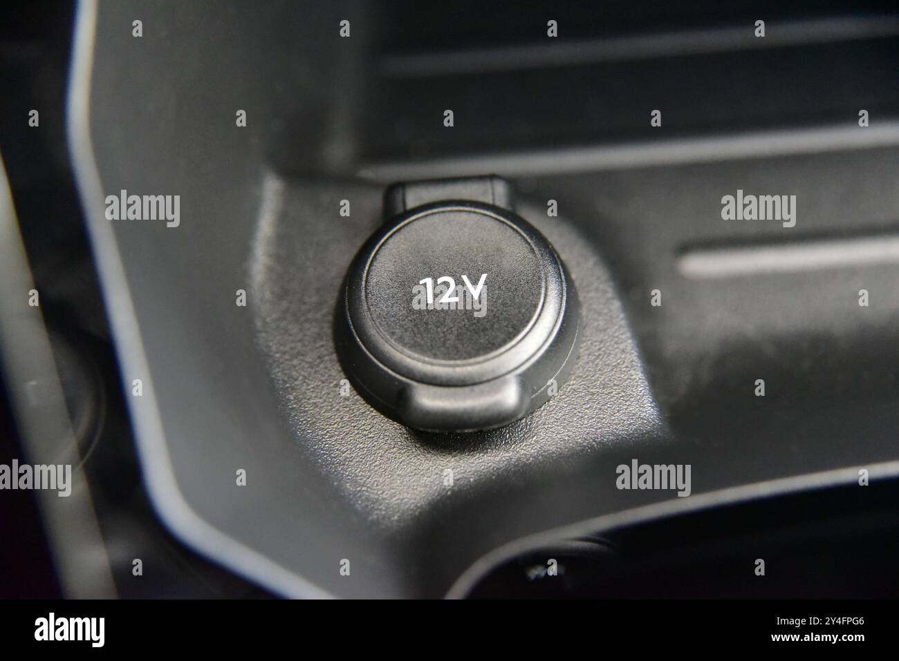 12 Volts power outlet socket in the car Stock Photo - Alamy